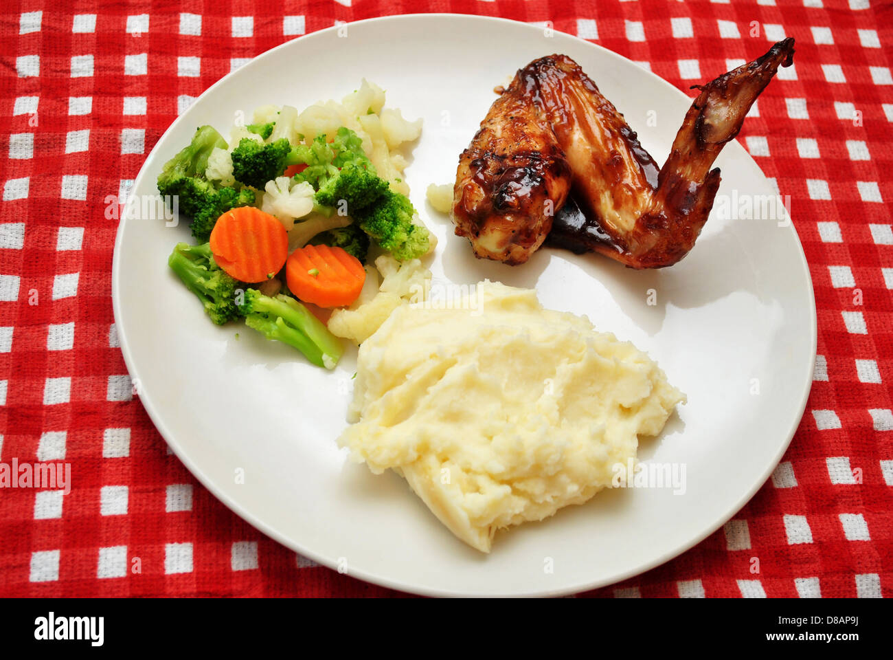 Healthy Chicken Wing Dinner with Red Stock Photo - Alamy