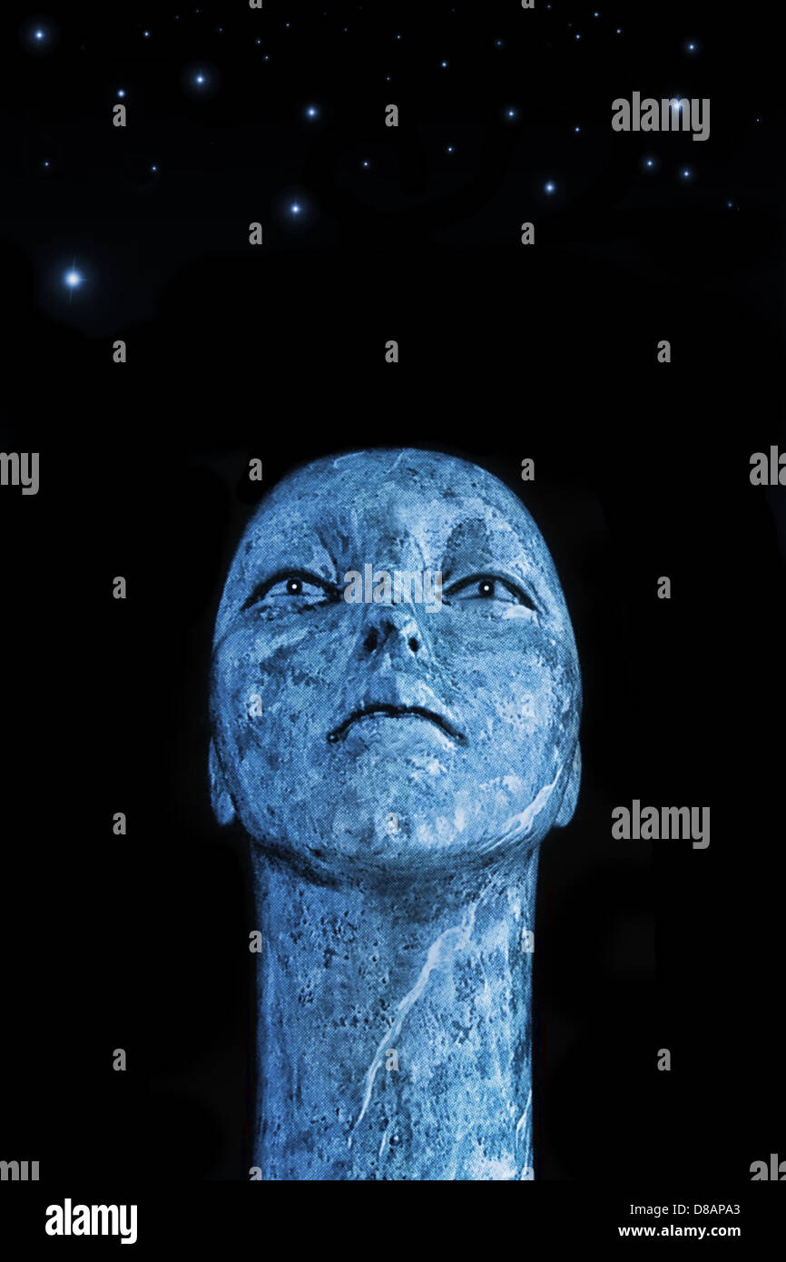 alien looking up at black night sky with stars Stock Photo - Alamy
