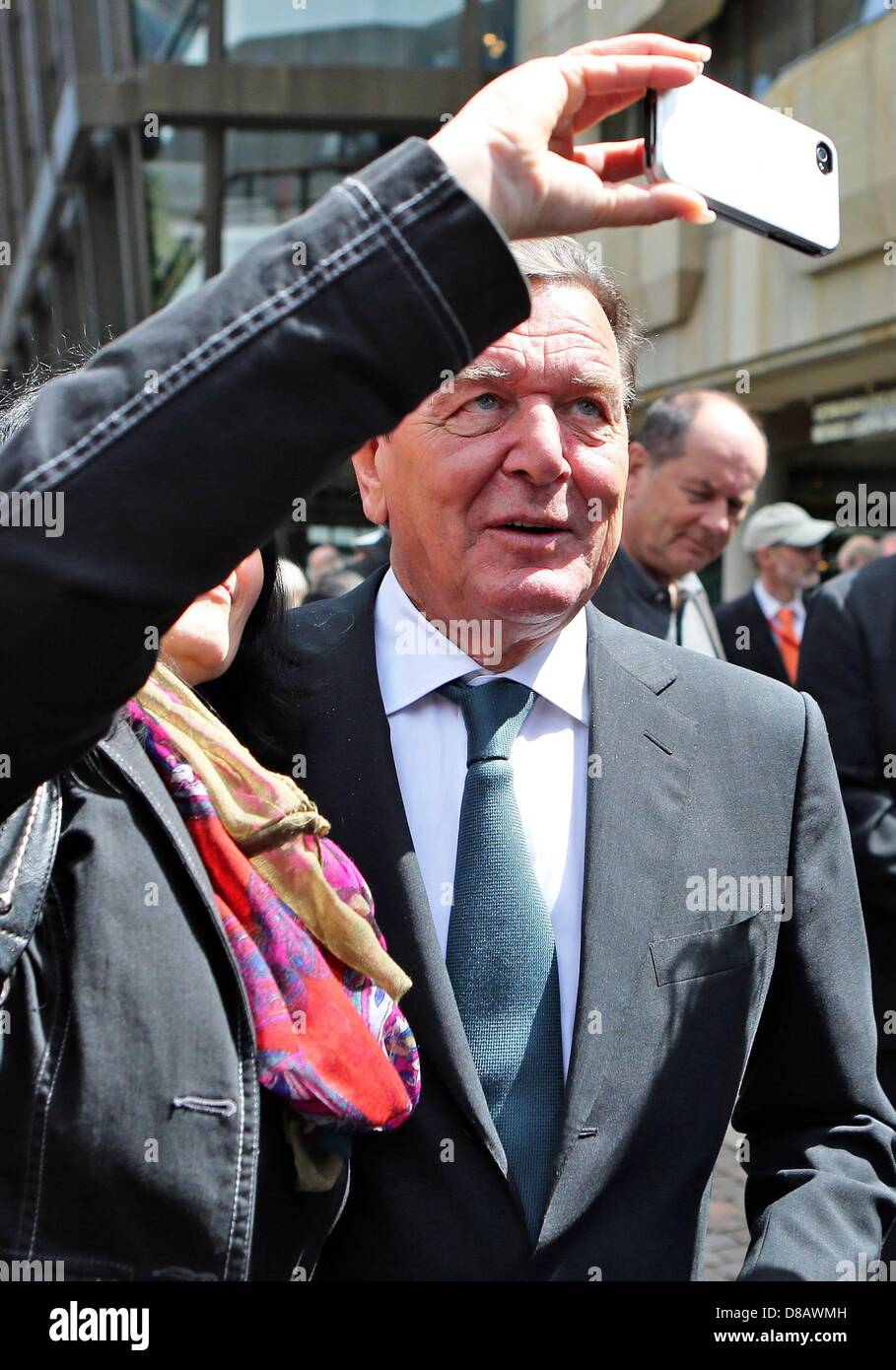 Former Chancellor Gerhard Schroeder leaves the ceremony to mark the ...