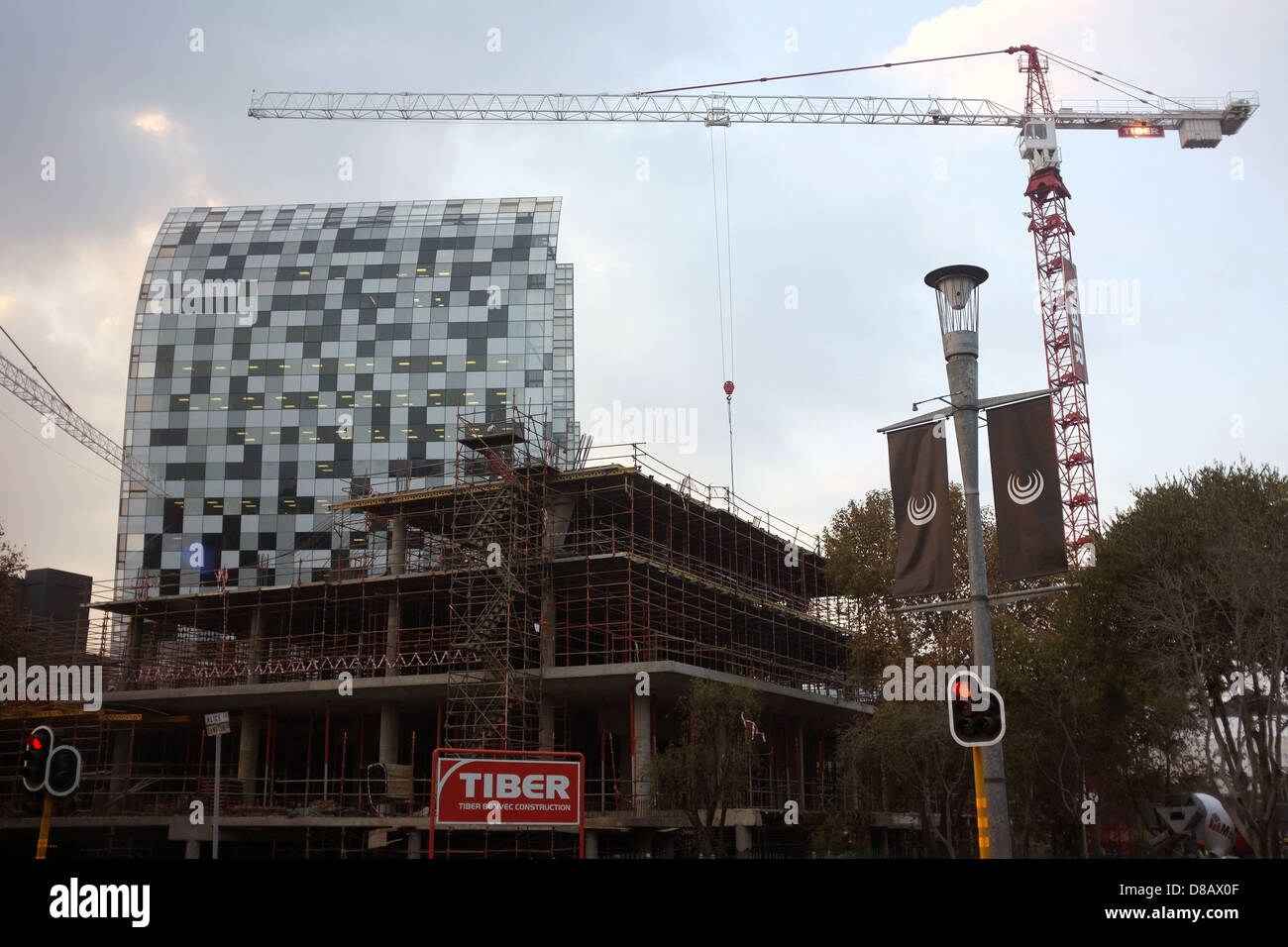 Tall construction crane stands above hi-res stock photography and ...