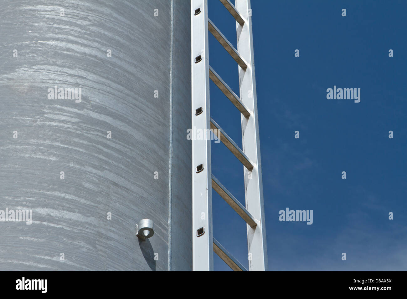 Industrial metal ladder on a chimney Stock Photo - Alamy