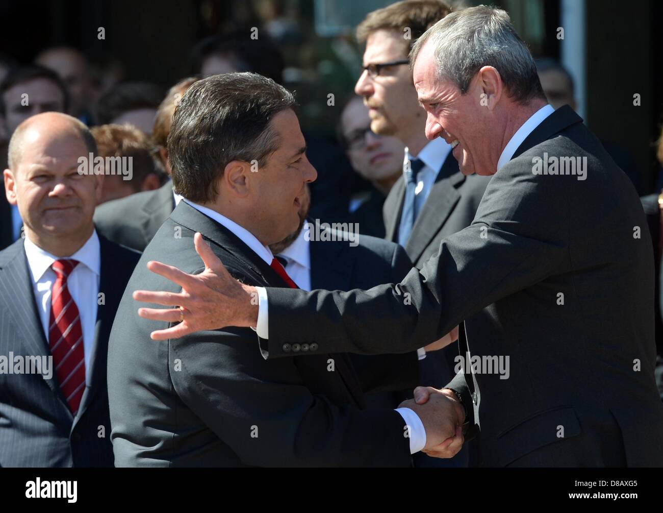 SPD chairman Sigmar Gabriel (L) greets American Ambassador Philip ...
