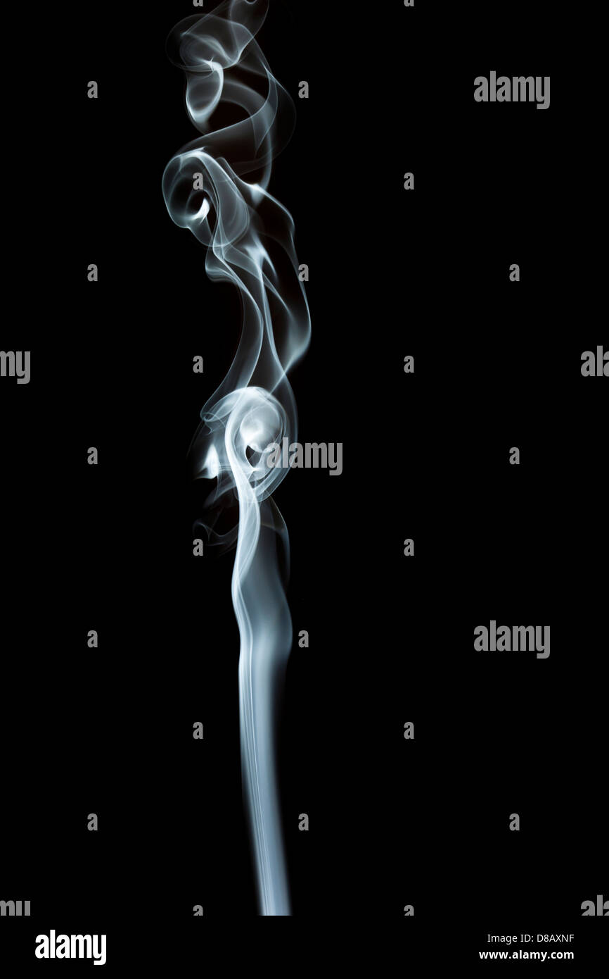 Whispy White Smoke against a black background Stock Photo - Alamy
