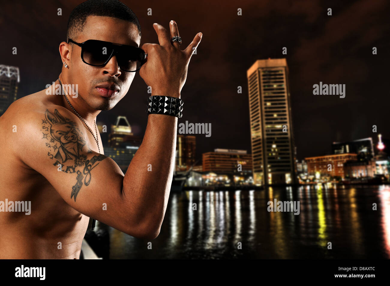 Young Hip Hop Dancer portrait with city skyline on the background at ...