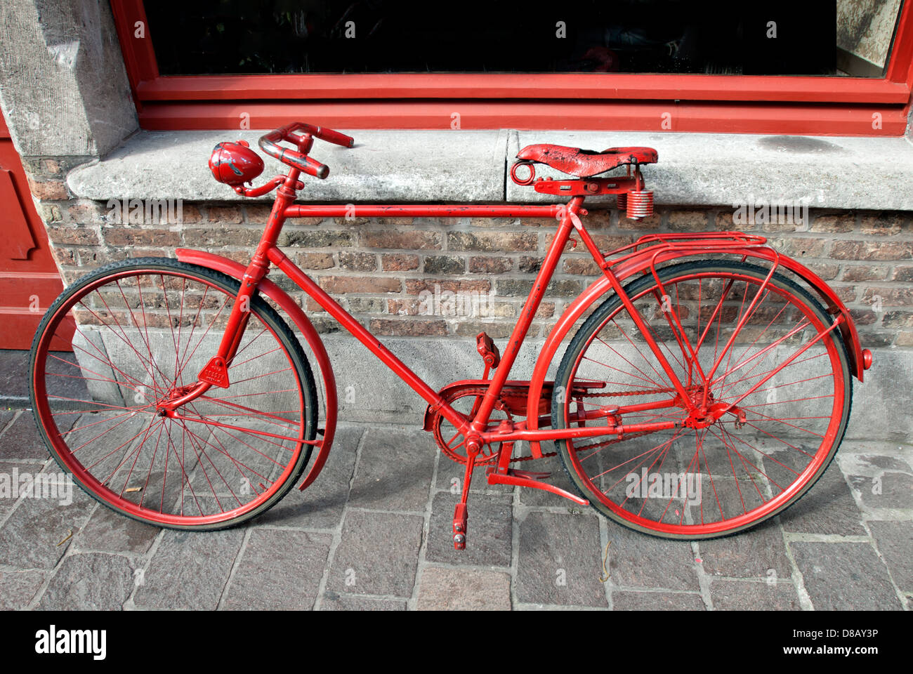 A red bicycle in Brugge, Belgium Stock Photo - Alamy