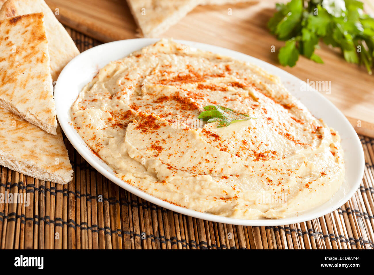 Fresh Made Organic Hummus with Pita Bread Stock Photo - Alamy