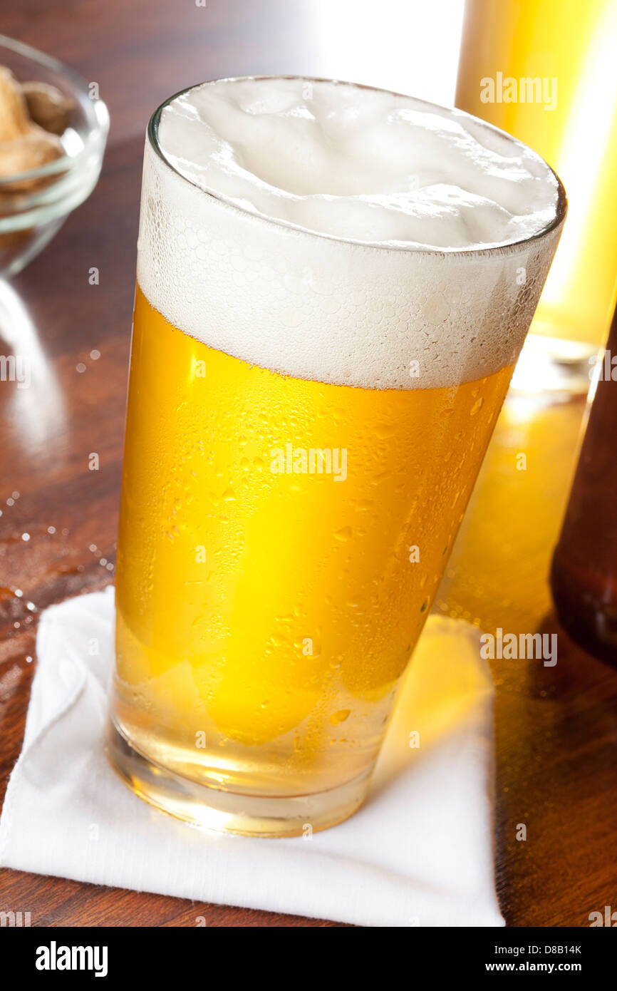 Refreshing Ice Cold Beer against a background Stock Photo - Alamy