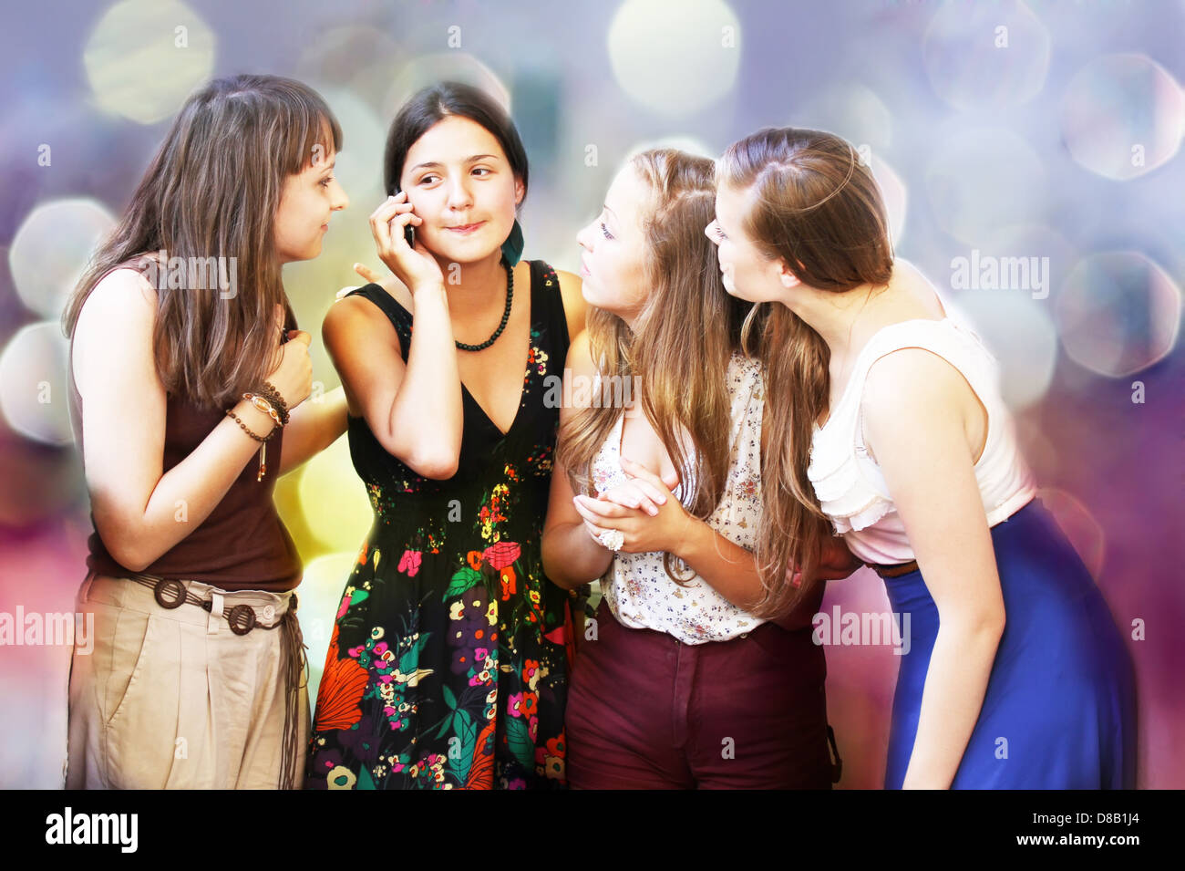 Beautiful student girls during phone call Stock Photo - Alamy