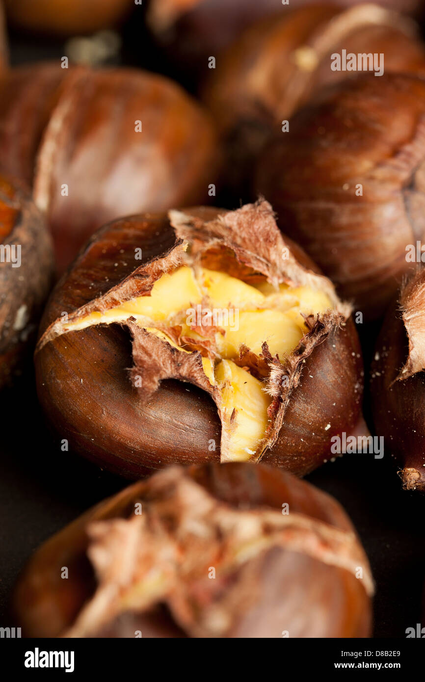 Organic Brown Chestnuts Roasting over a hot fire Stock Photo - Alamy