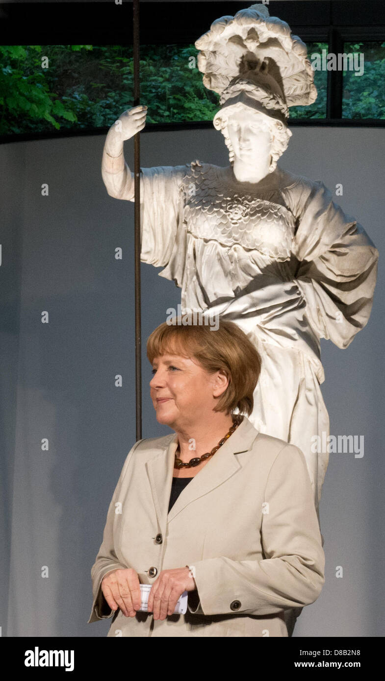 German Chancellor Angela Merkel takes part in a reception for first ...