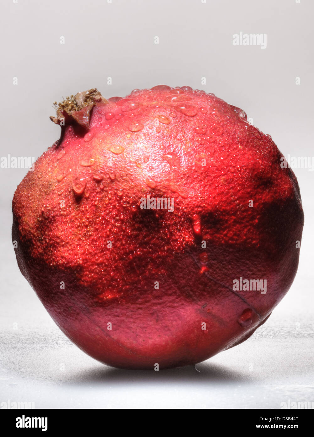 Cracked ripe pomegranate fruit on hi-res stock photography and images ...