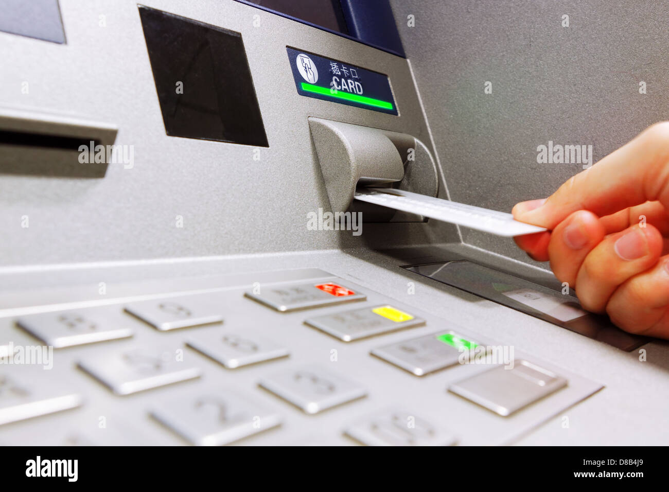 Inserting Credit Card In Atm High Resolution Stock Photography and ...