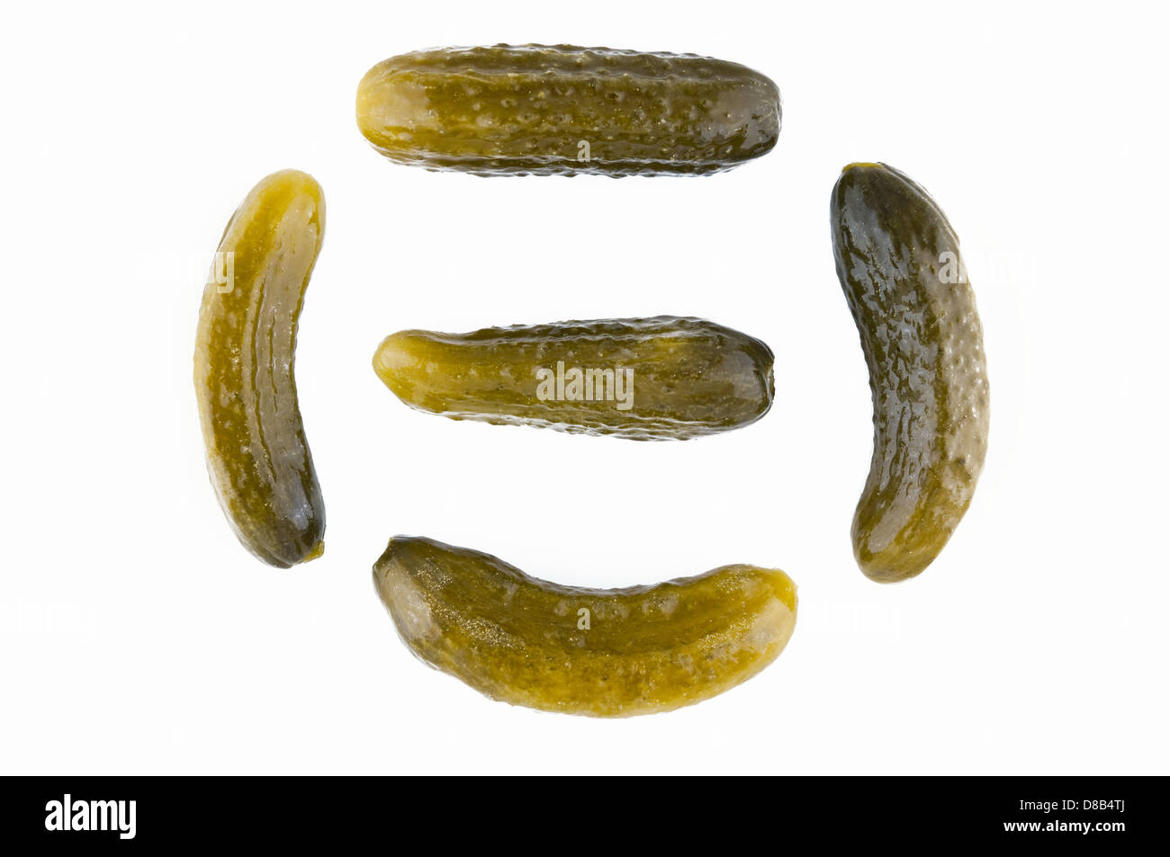 five pickles isolated on a white background Stock Photo - Alamy