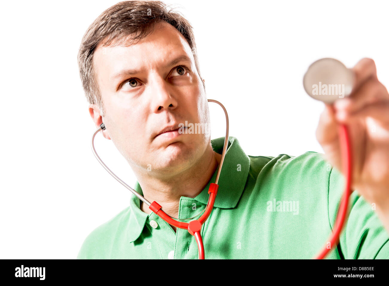 Man with a doctor holding a stethoscope hi-res stock photography and ...
