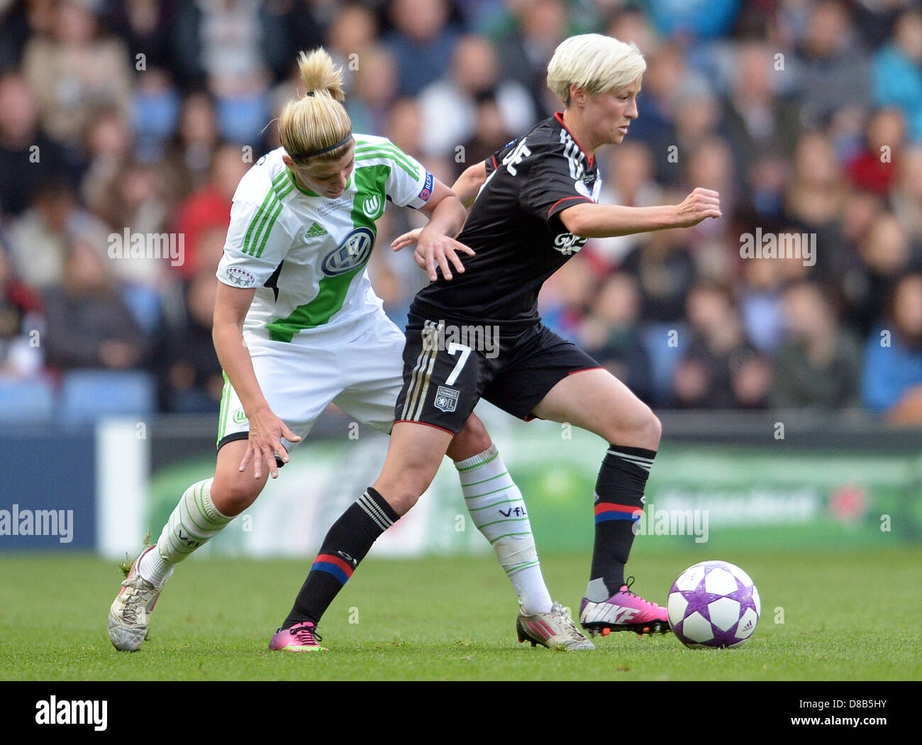 Wolfsburg's Luisa Wensing (L) and Lyonnais' Megan Rapinoe vie for the ...
