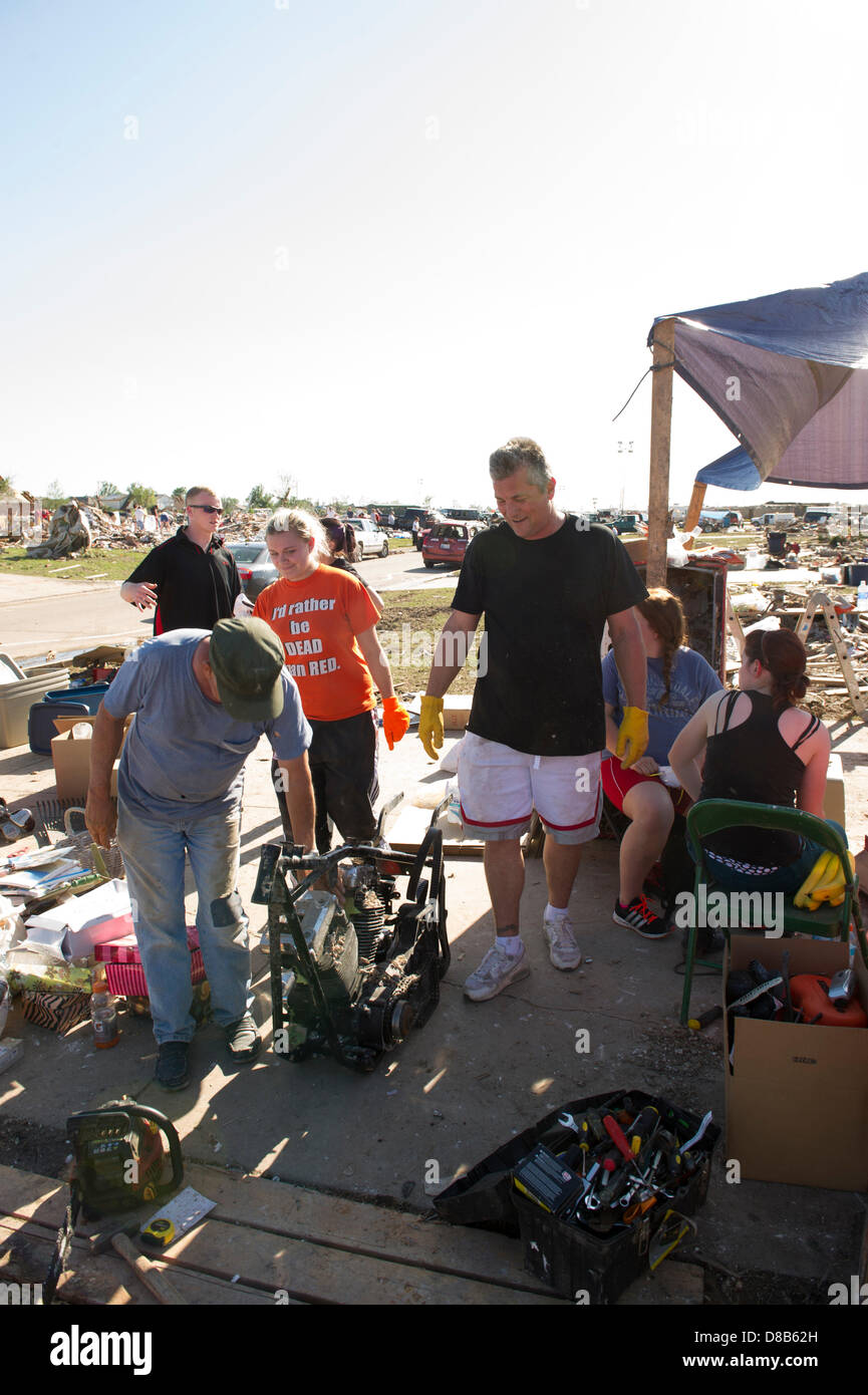 May 22 2013 Moore Oklahoma. Gerald Mobley and his friends drags his ...