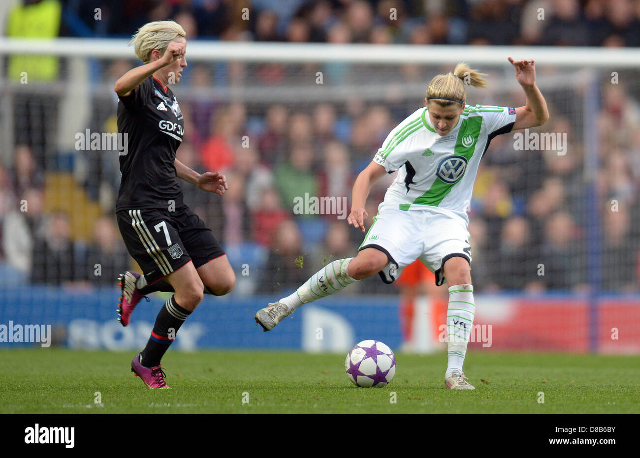 Wolfsburg's Luisa Wensing (R) and Lyonnais' Megan Rapinoe vie for the ...