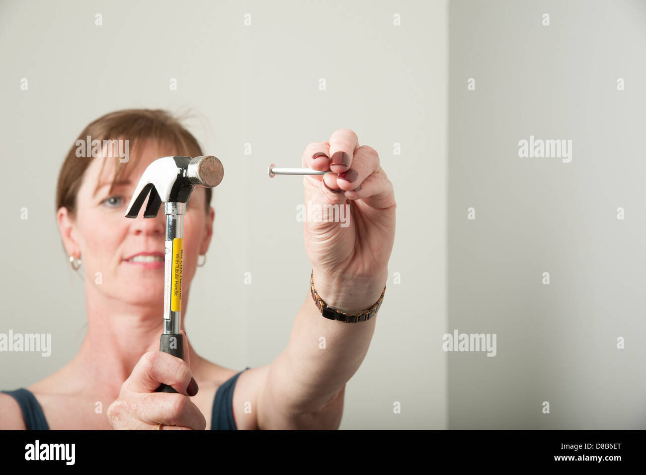 Using a hammer hi-res stock photography and images - Alamy