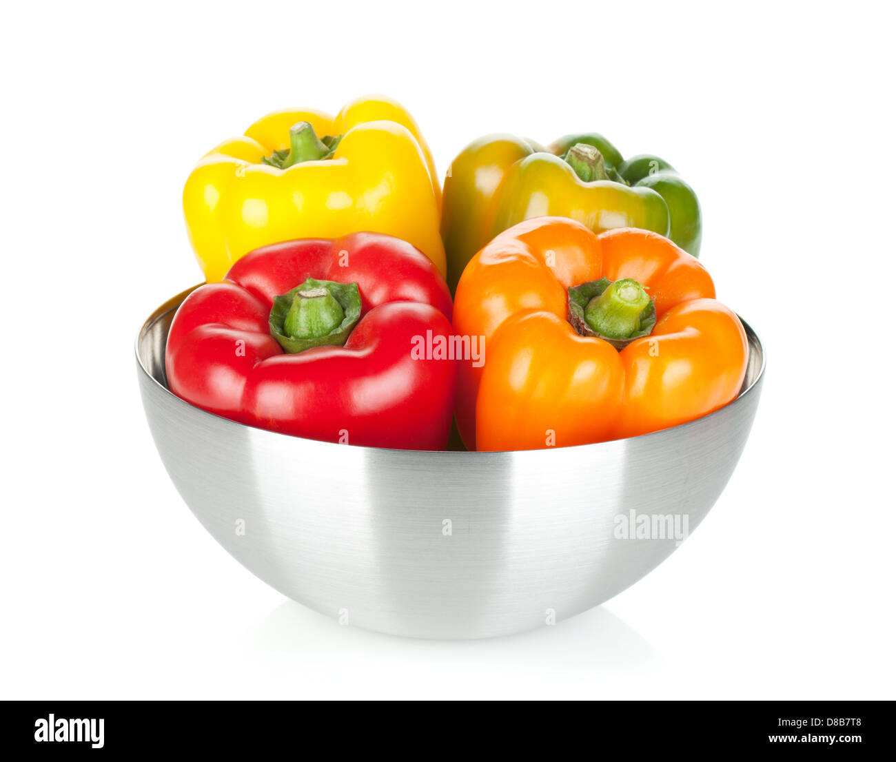 Four bell peppers in a bowl. Isolated on white background Stock Photo ...