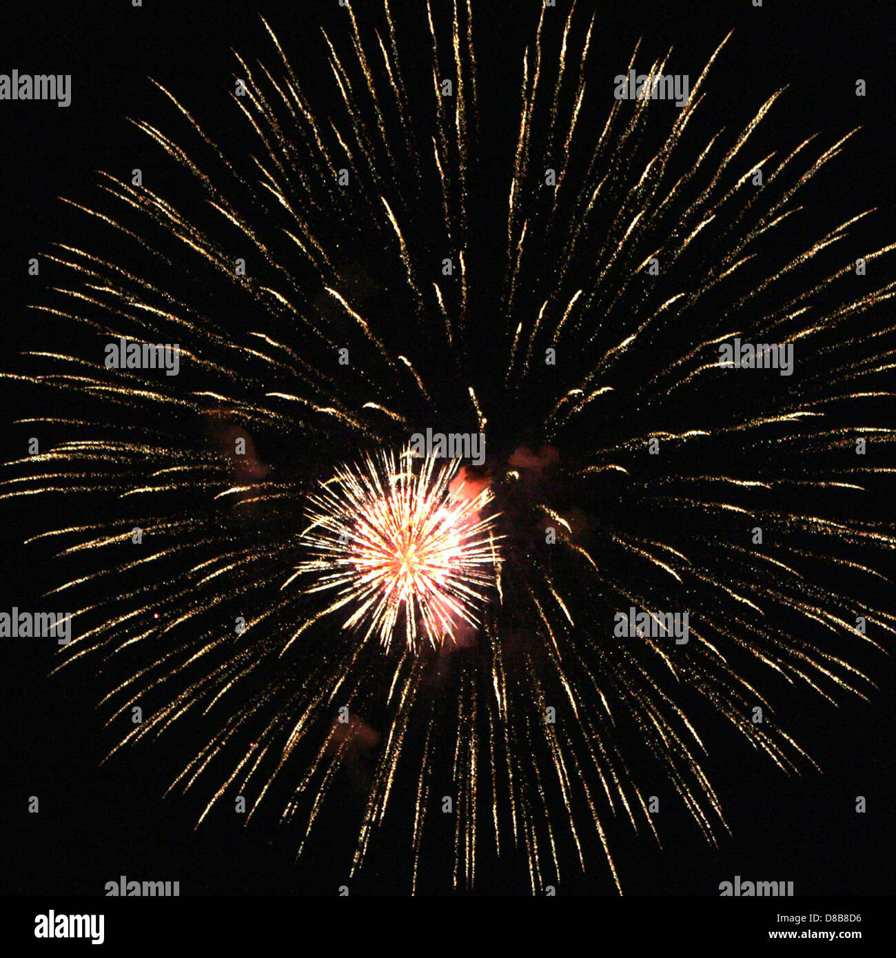 A vibrant display of fireworks lighting up the night sky on the 4th of ...