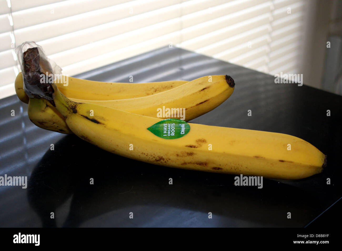 A bunch of ripe bananas with a yellow skin, showcasing the fruit’s ...