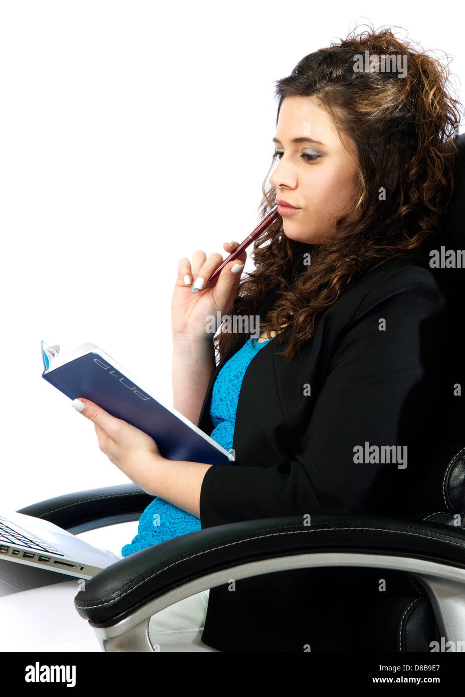 Attractive woman writing appointments in her schedule Stock Photo - Alamy