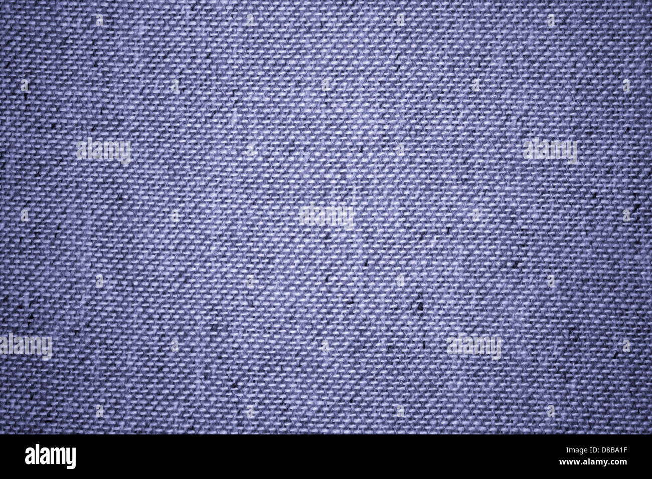 A close-up shot of blue-gray upholstery fabric, highlighting its smooth ...