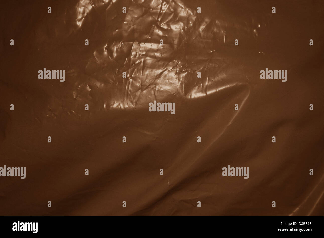 This image features the texture of brown plastic, showcasing its smooth ...