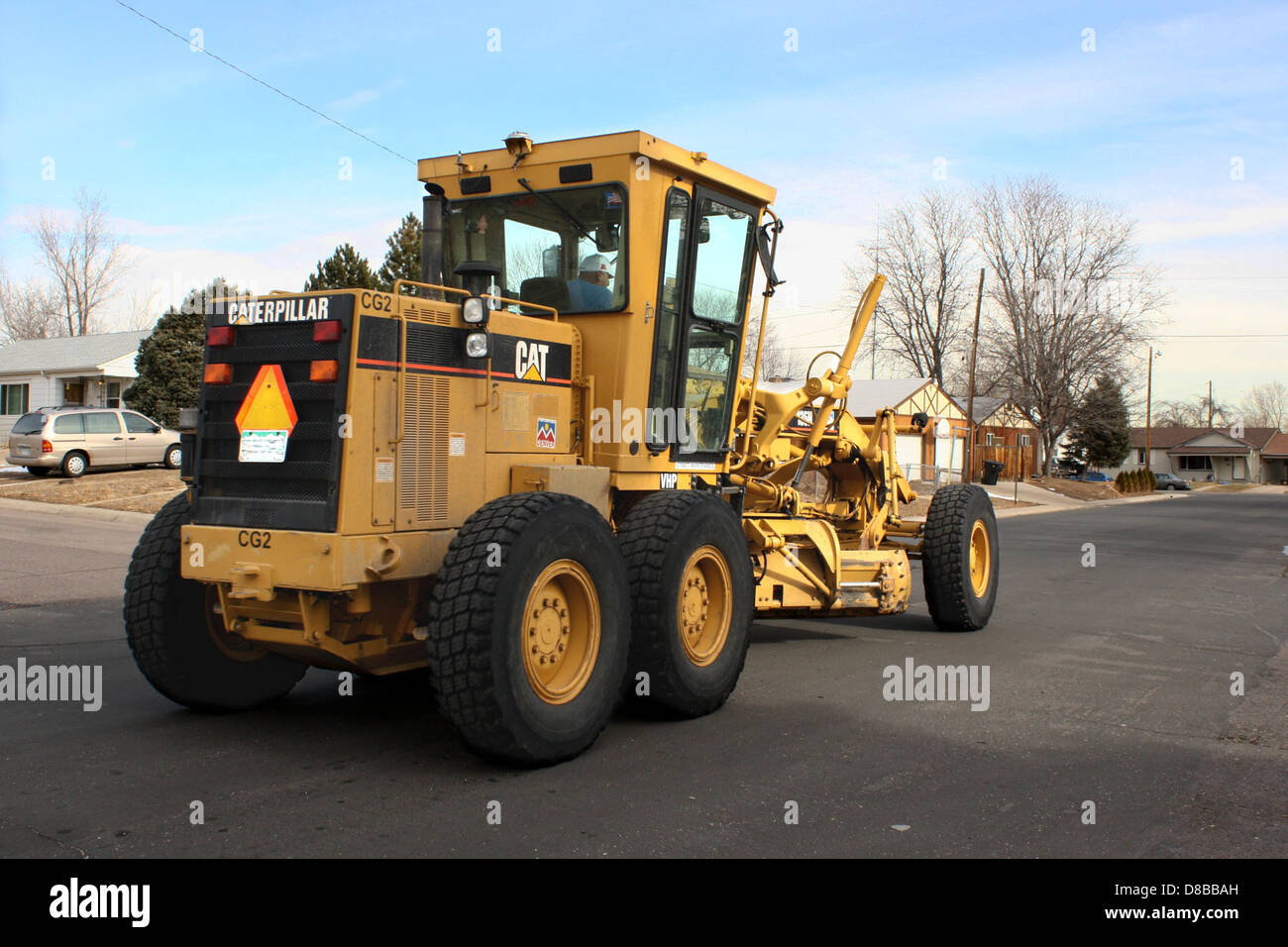 This image shows a Caterpillar street maintenance truck, a heavy-duty ...