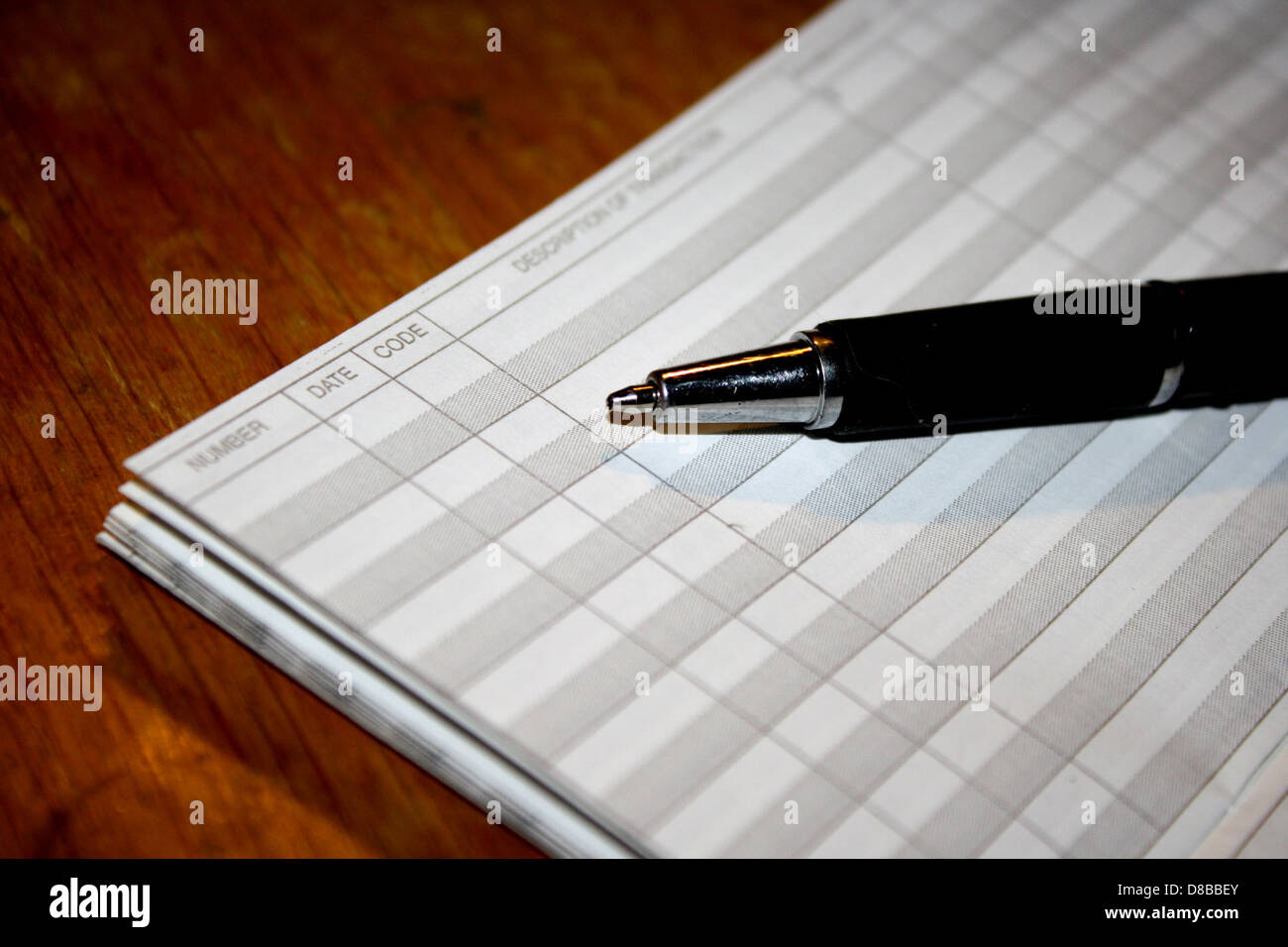 A check register used to track and manage personal or business finances ...