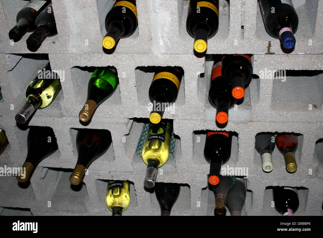 A wine cellar constructed with cinder blocks, showcasing the practical ...