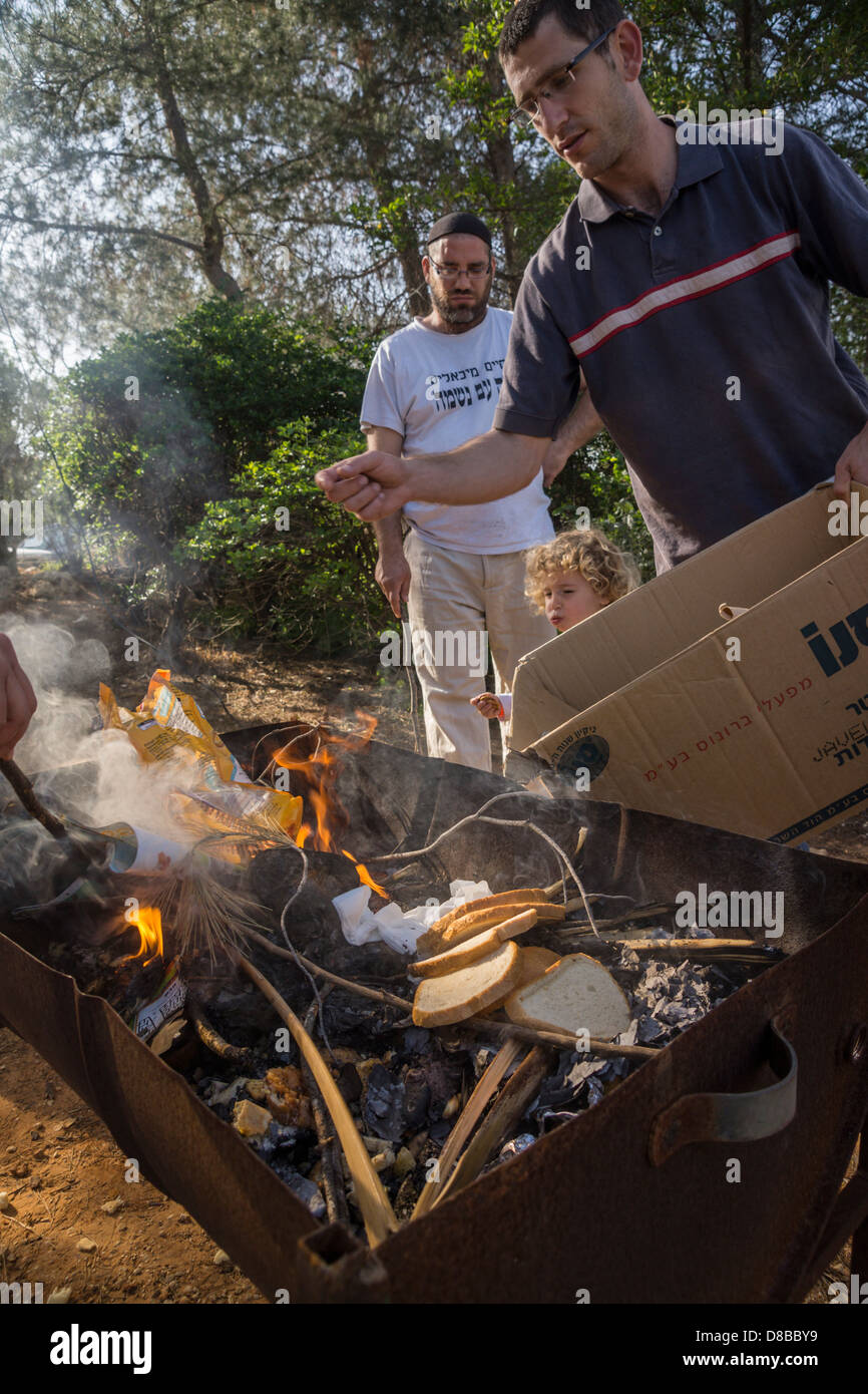 Orthodox jews burn bread and wheat produts as part of preperations for ...
