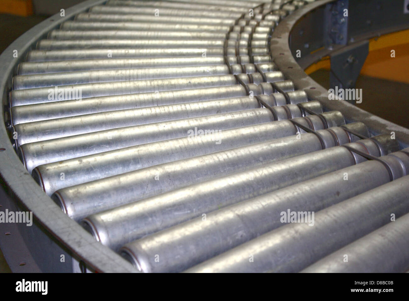 A close-up of a conveyor belt used in manufacturing or industrial ...
