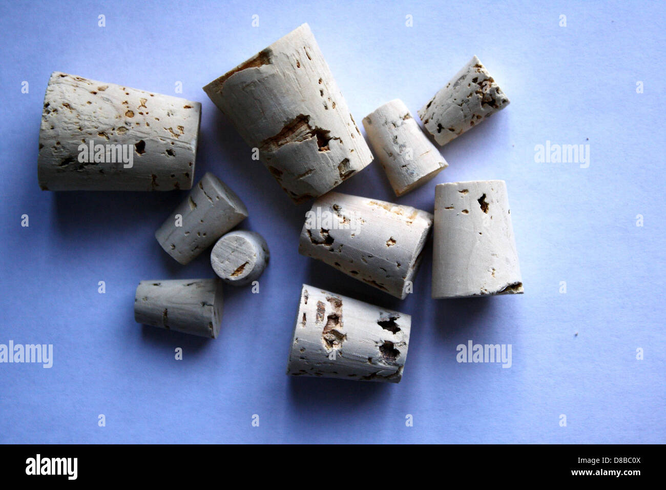 This image shows a collection of cork stoppers, often used for sealing ...