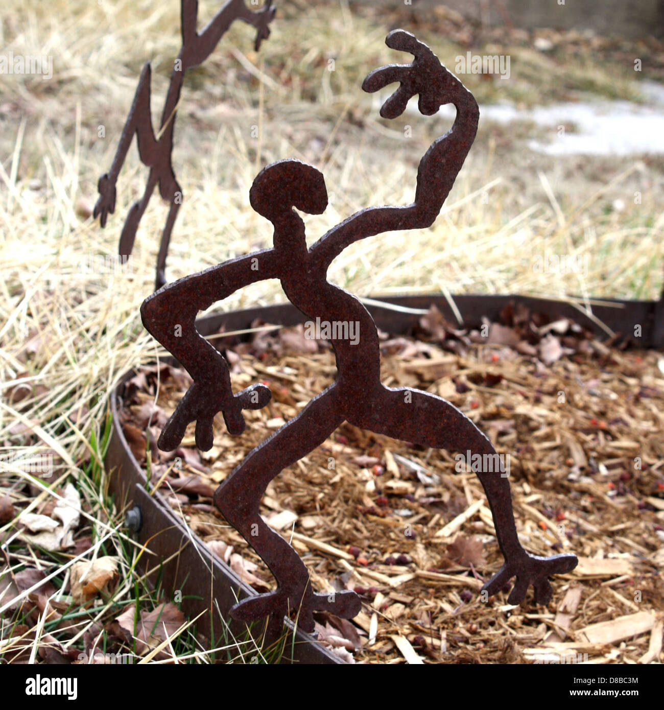 crazy dancing man rusted metal figurine Stock Photo - Alamy