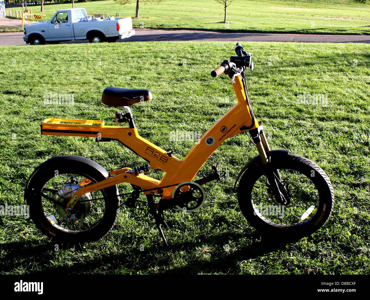 An electric bicycle is displayed with modern, sleek design. This eco ...