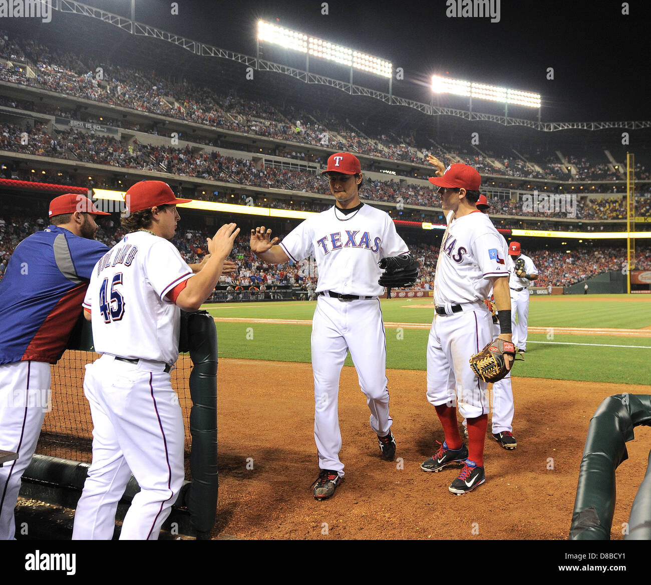 High fives teammates in the dugout hi-res stock photography and images ...