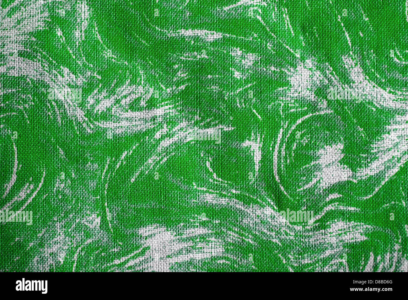 A close-up image of a fabric with a Kelly green swirl pattern. The ...
