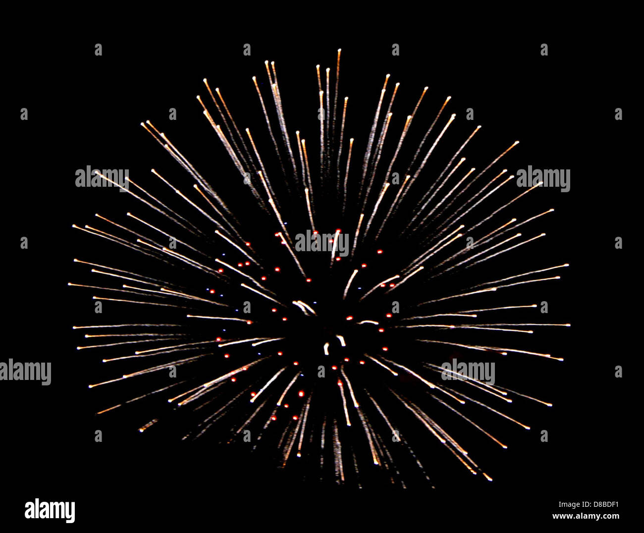 A vibrant image of fireworks exploding in the sky, with red, white, and ...