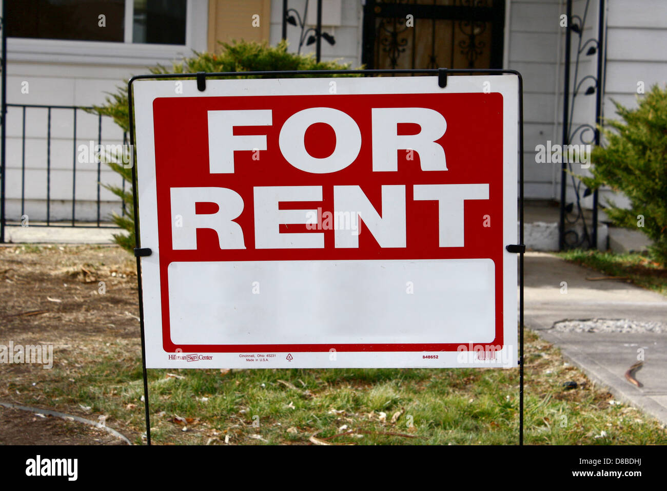 The image features a typical 'For Rent' sign, displayed in front of a ...