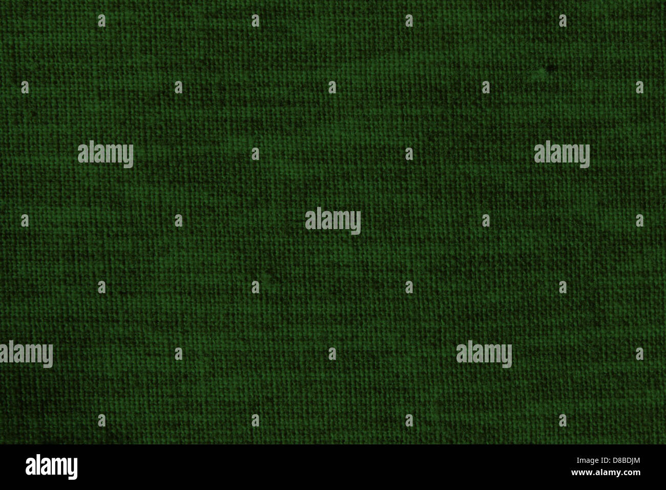 A detailed view of a forest green woven fabric texture, showcasing the ...