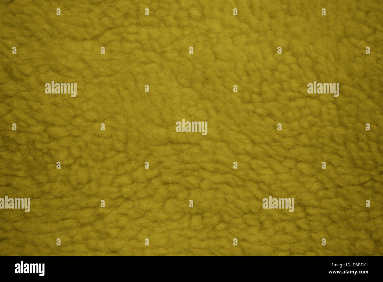 gold fleece faux sherpa wool fabric texture Stock Photo - Alamy