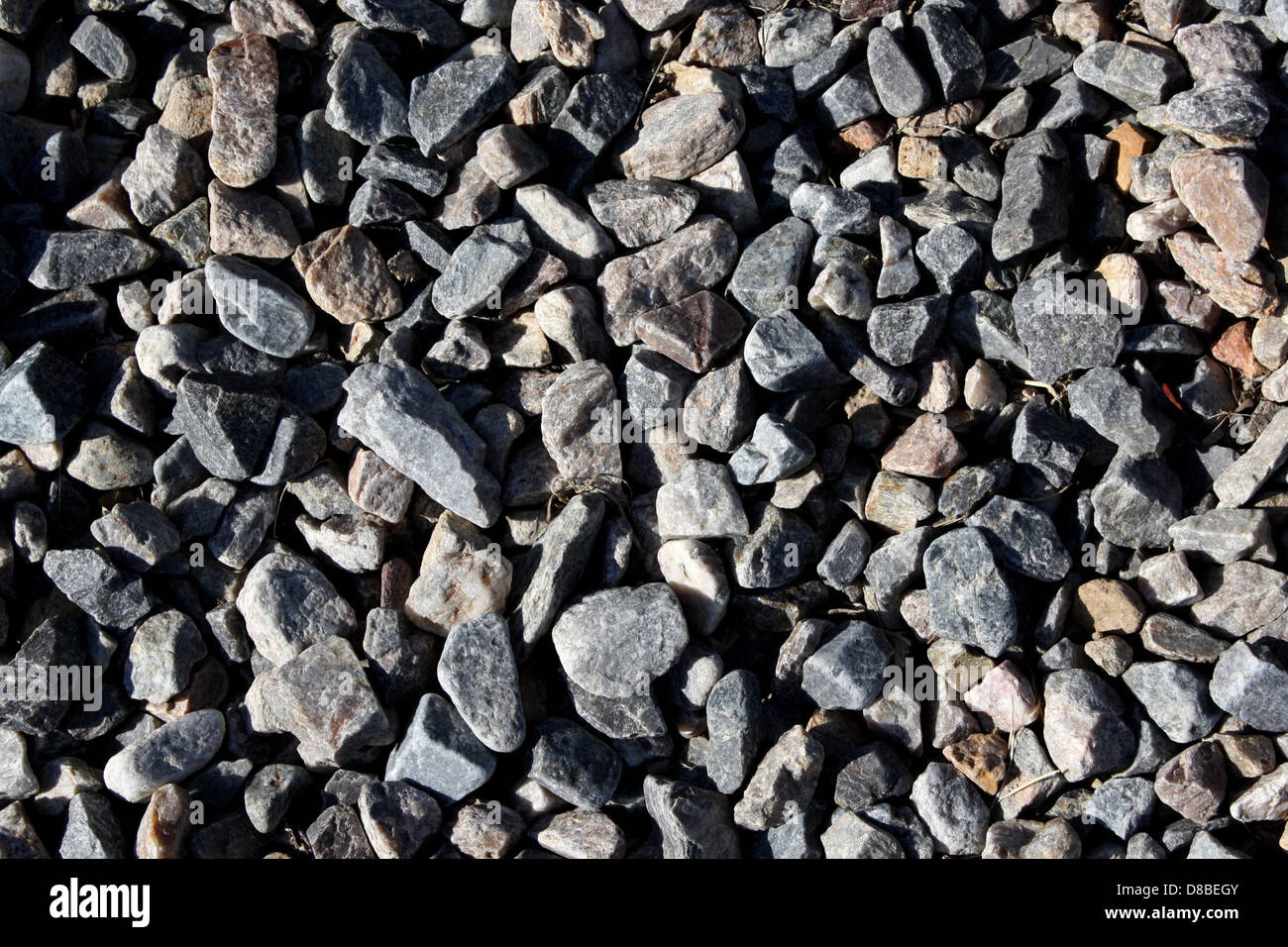 This image showcases the texture of gray rock gravel. The gravel ...