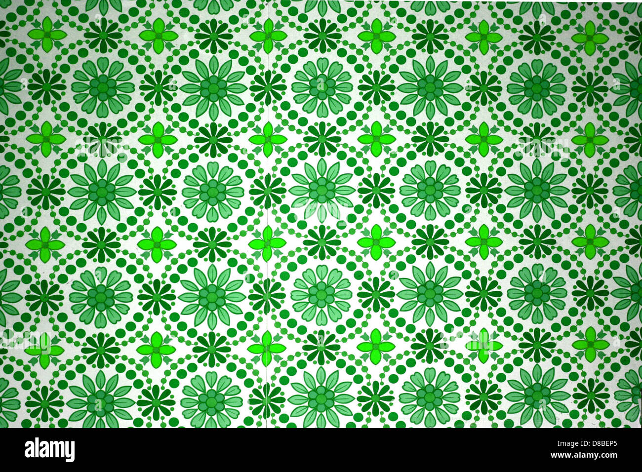 A close-up image of green flowers arranged in a pattern, creating a ...