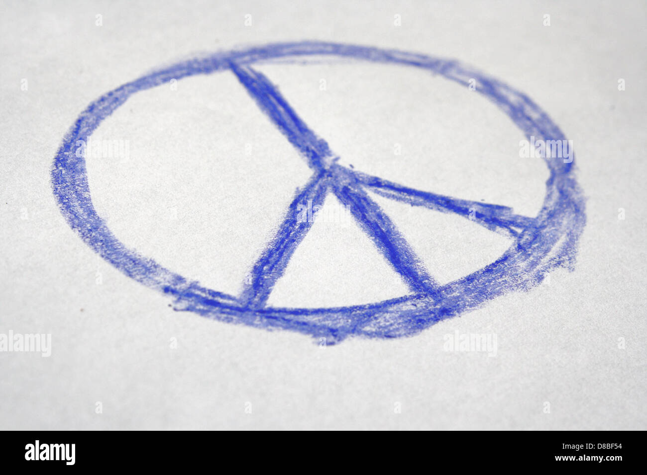 A hand-drawn crayon peace sign, often used as a symbol of hope, unity ...