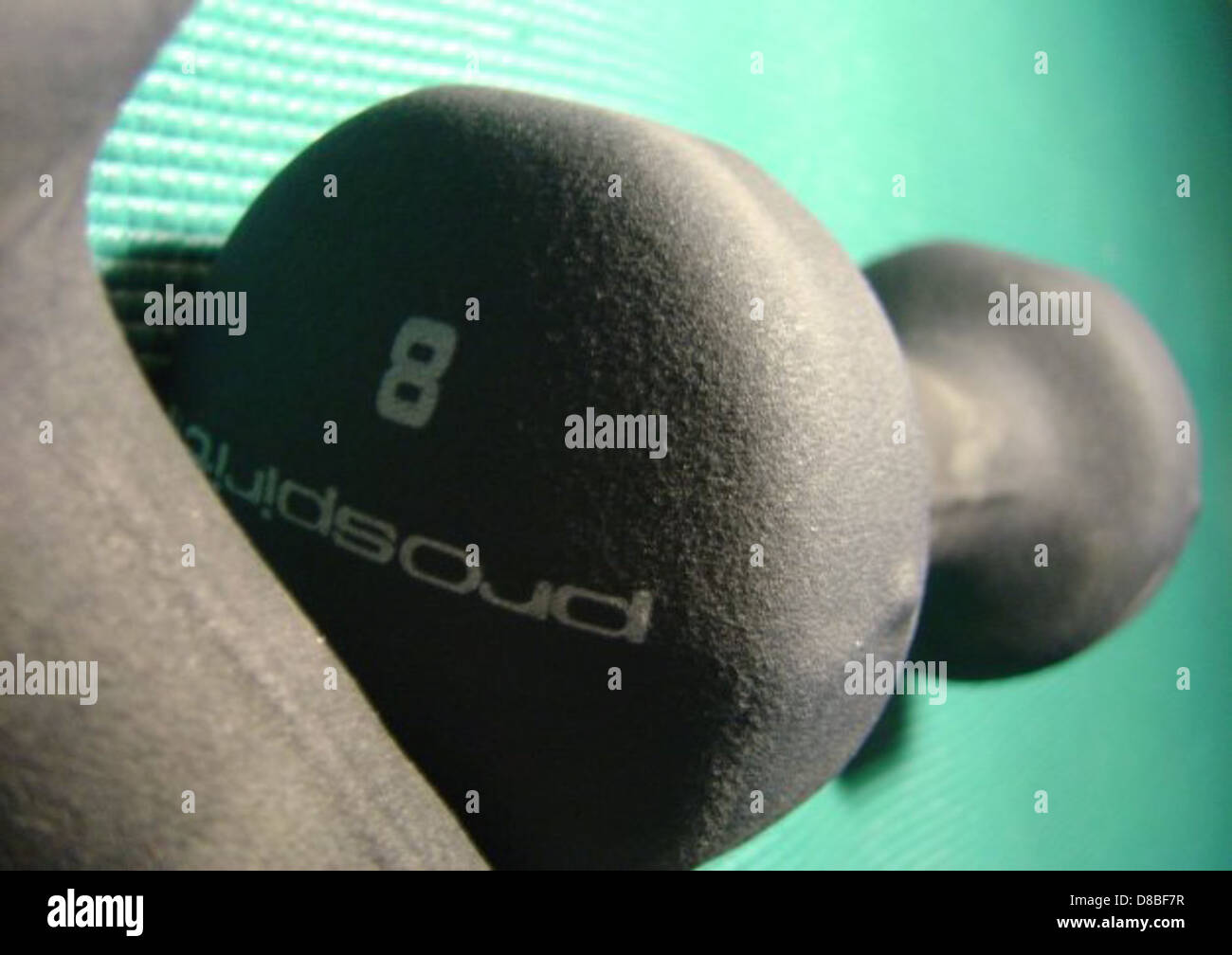 A close-up image of hand weights, which are commonly used for strength ...