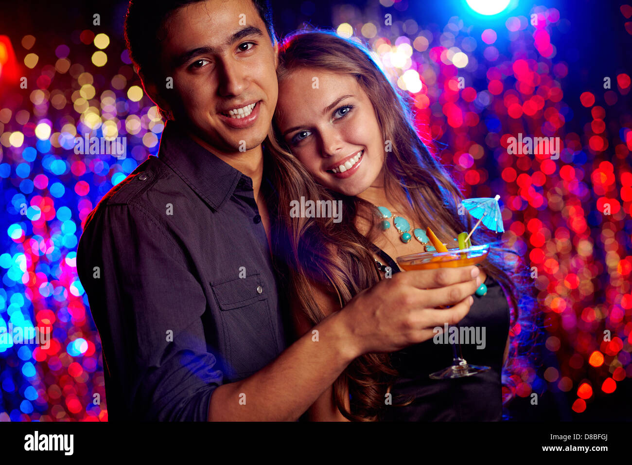 Image of happy couple at party in the night club Stock Photo - Alamy
