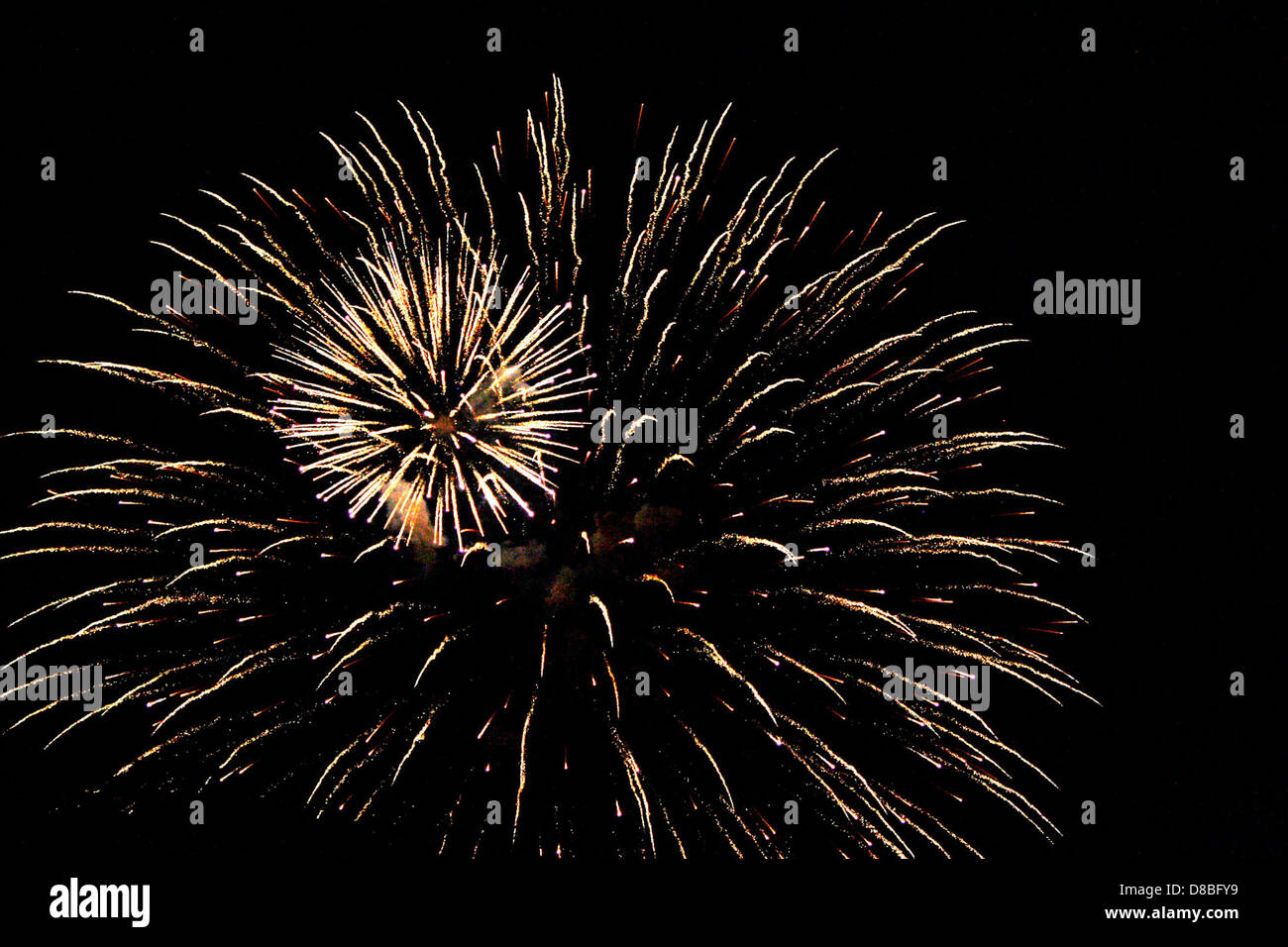 A vibrant fireworks display lighting up the sky on July 4th. The bright ...