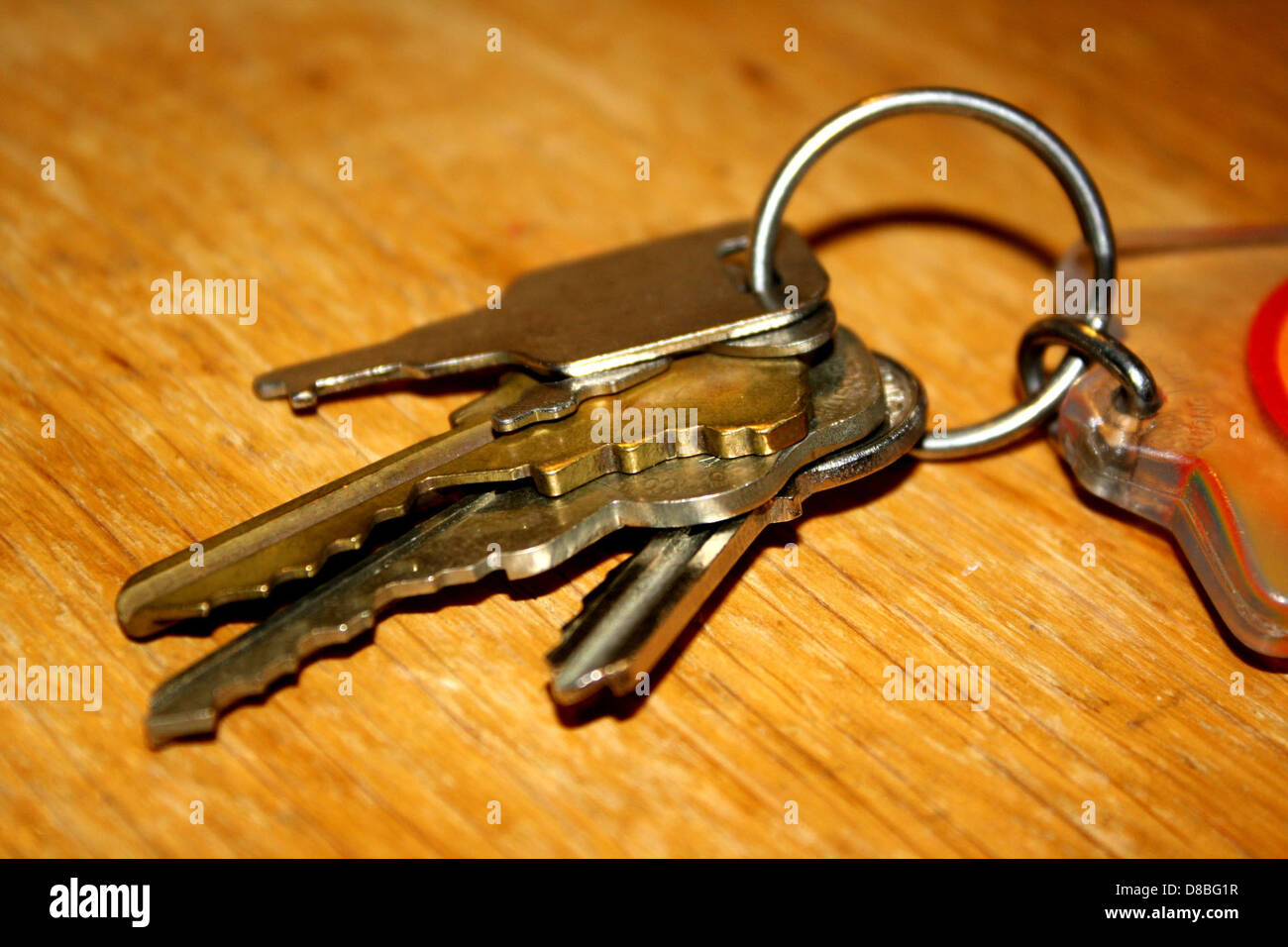 A close-up shot of a set of keys, focusing on their metal structure and ...