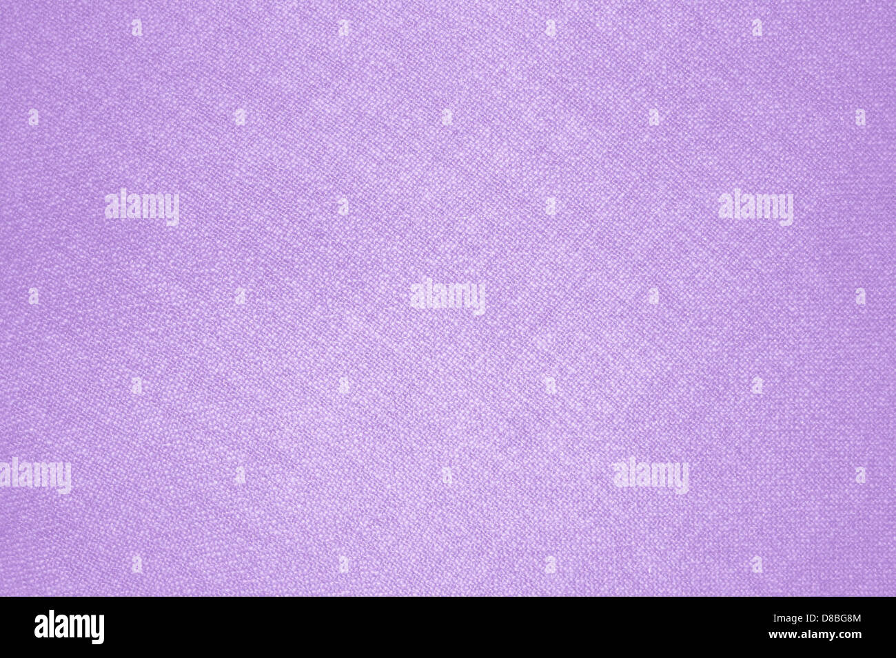A close-up shot of lavender fabric, showcasing its smooth texture and ...